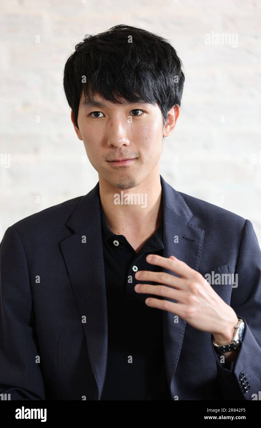 Eric Lu , an American pianist ,speaks during an interview by the ...