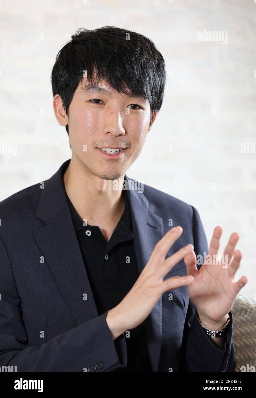 Eric Lu , an American pianist ,speaks during an interview by the ...