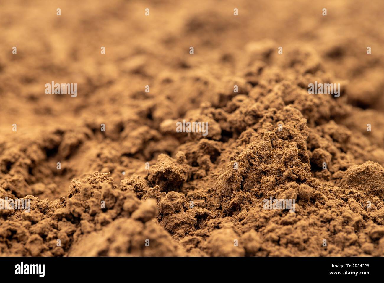 Pile of cocoa powder as background, spice or seasoning as background ...