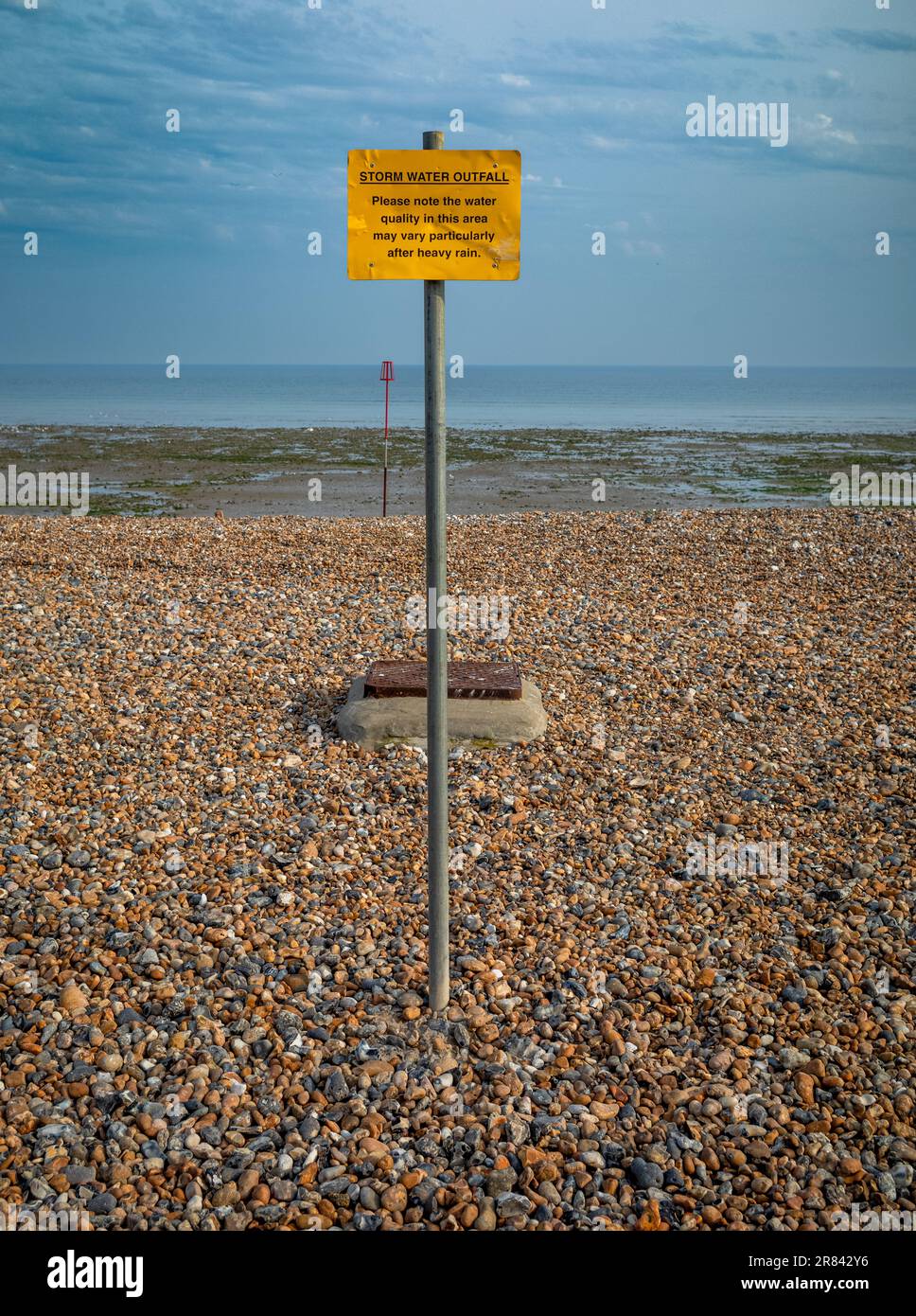 A sign warning people of the dangers from polluted water, especially ...