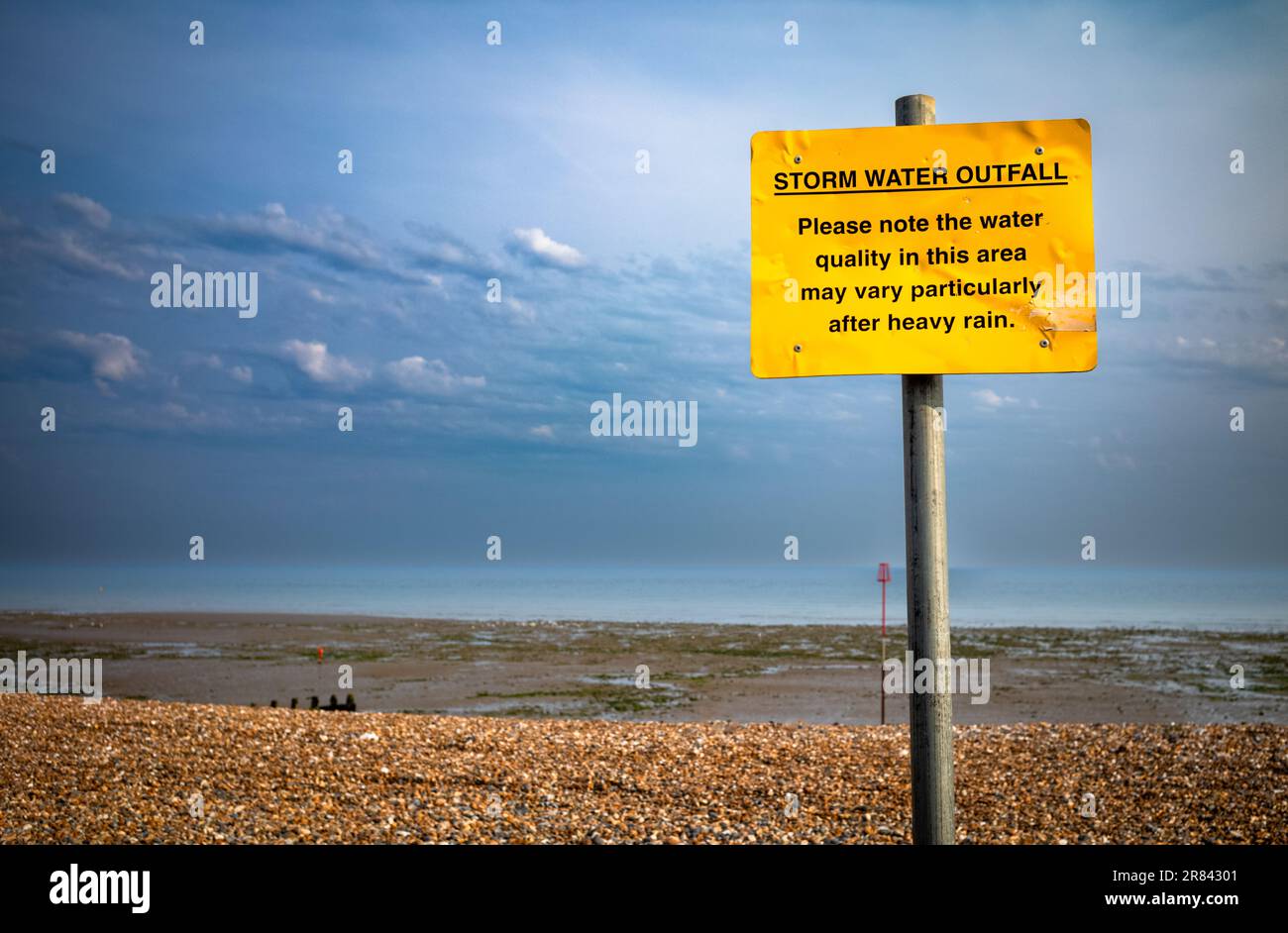 A sign warning people of the dangers from polluted water, especially ...