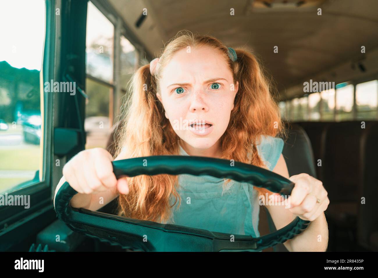 Tennager drive schoolbus. Teen driver on School Bus Stock Photo - Alamy