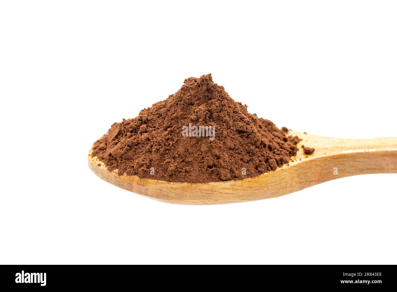 Cocoa powder on wooden spoon. Pile of Cocoa powder isolated on white ...