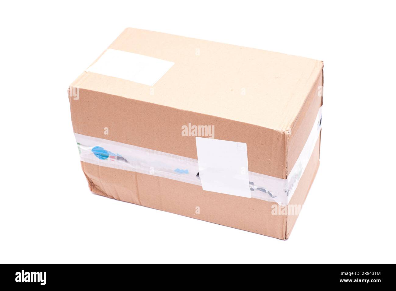 Cardboard box sealed with tape isolated on white background Stock Photo ...