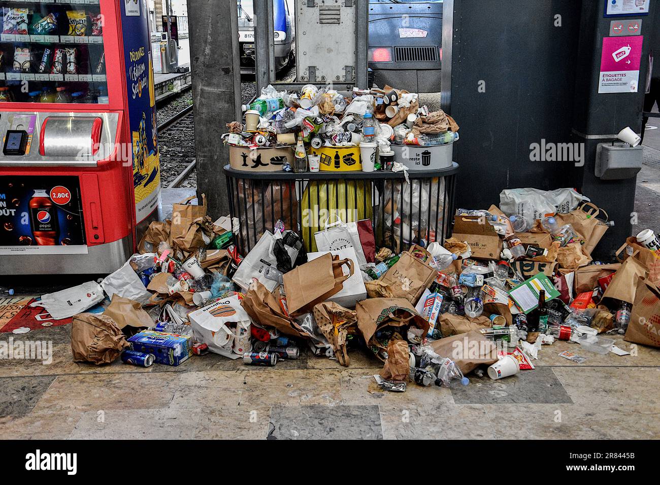 Waste that overflows from bins to litter the ground is seen at Saint ...