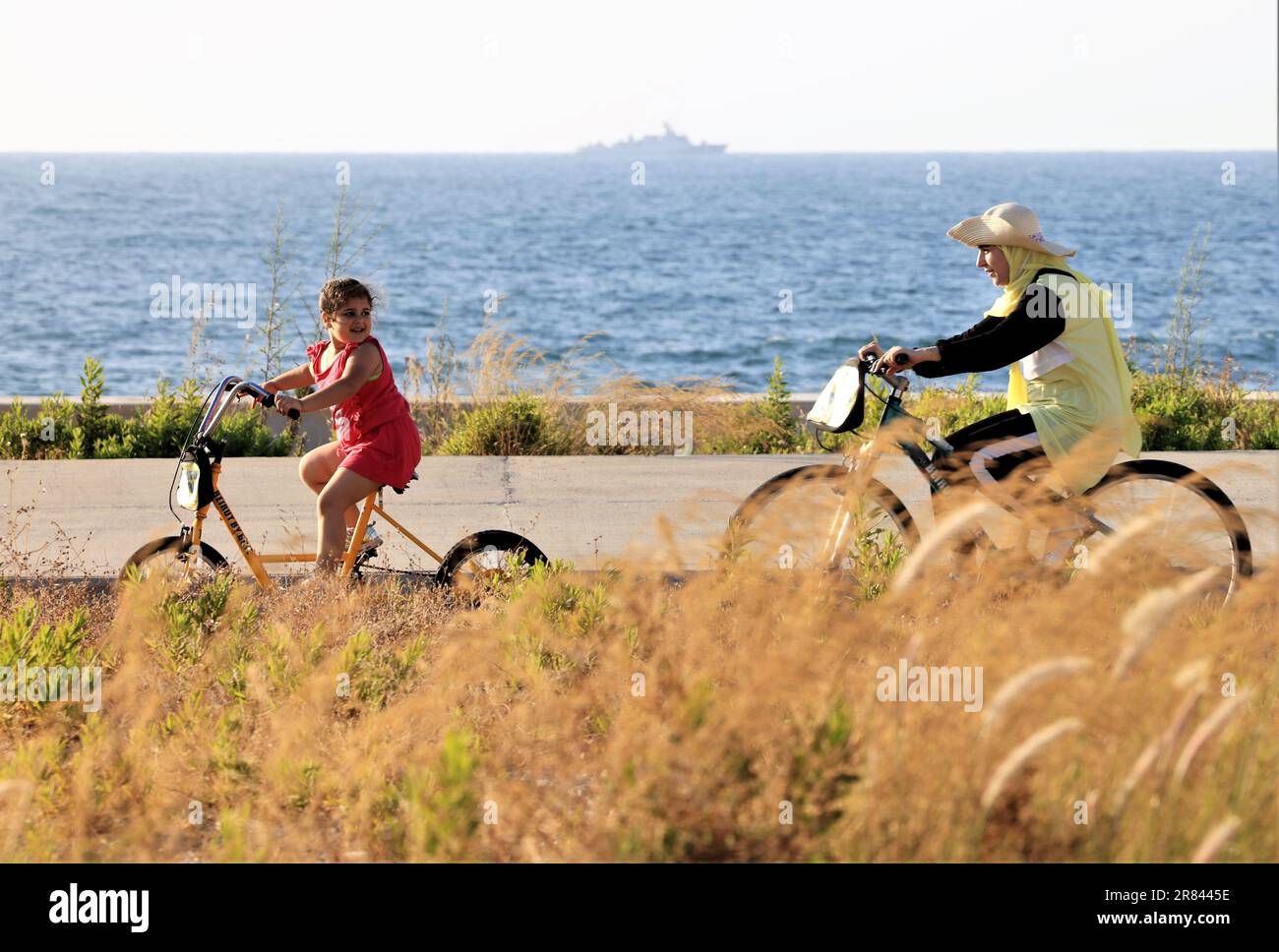 Beirut, Lebanon. 18th June, 2023. A mother and her girl enjoy riding ...