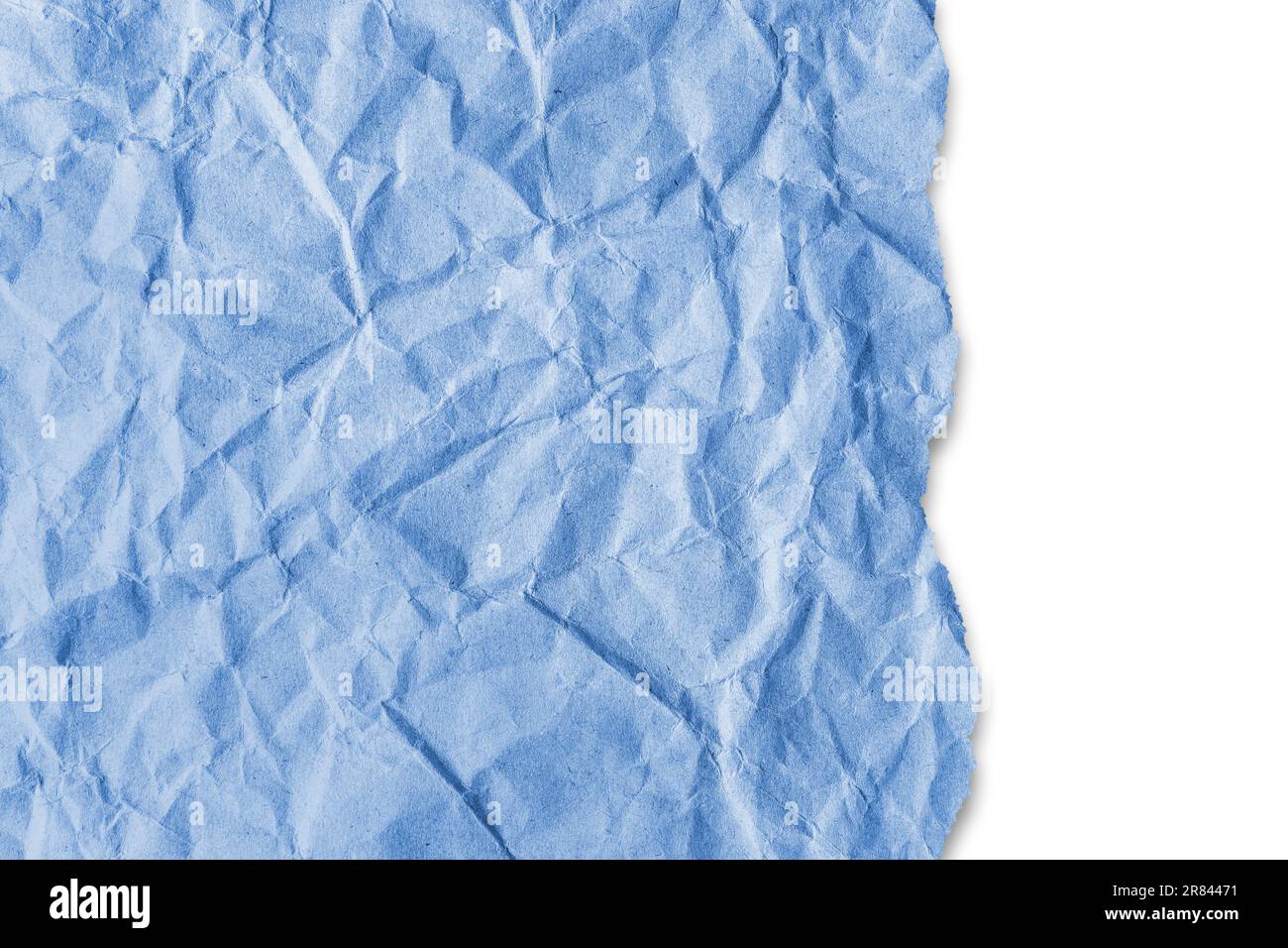 Recycled crumpled blue paper texture with a torn edge isolated on white ...