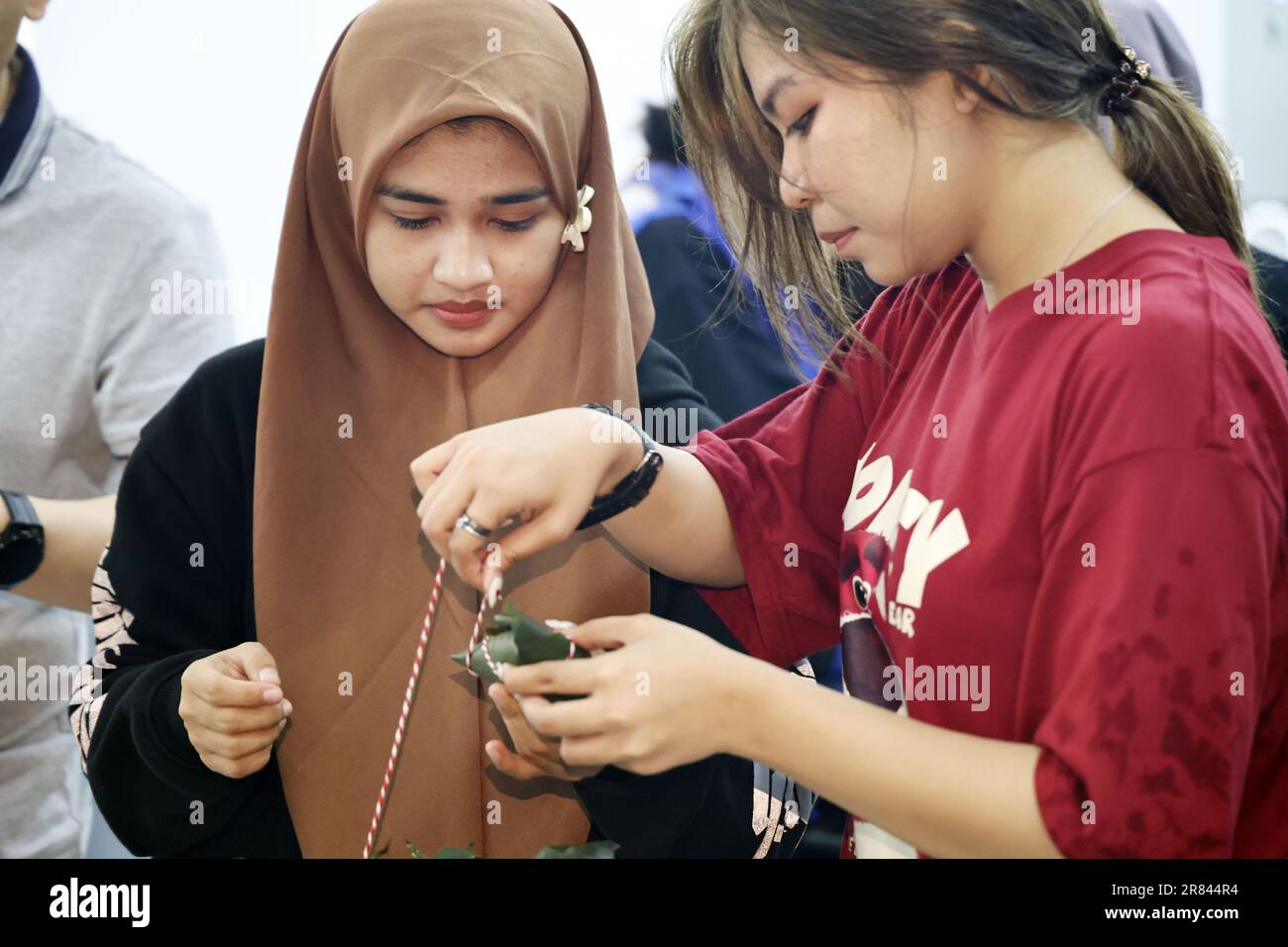 Teachers and students from the School of Environmental and Biological Engineering at Nantong ...