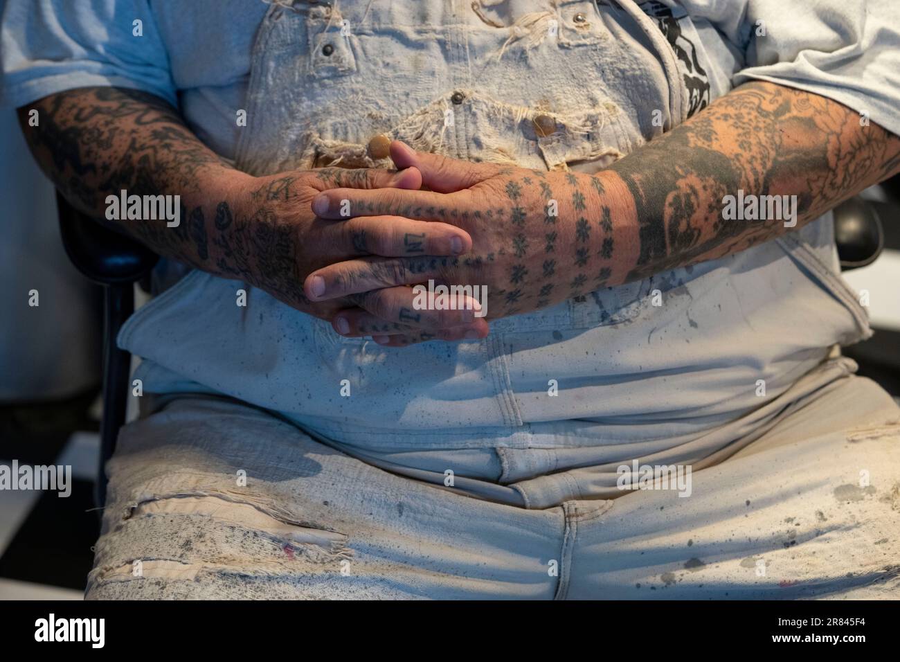 Henk Schiffmacher's talks after his needle whirred as he tattood the ...