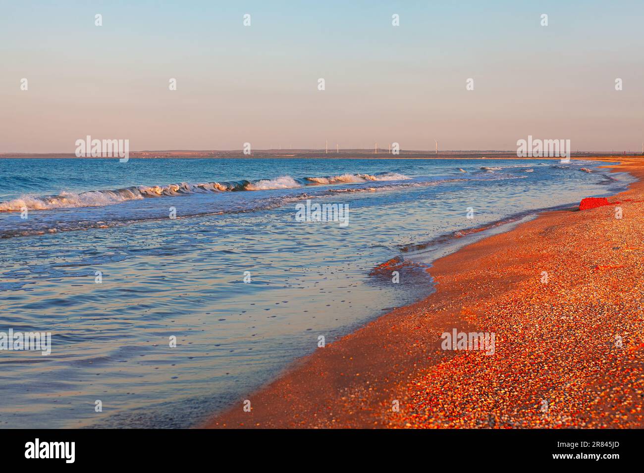 Seashells at beach and waves . Sea of Azov in the morning Stock Photo ...