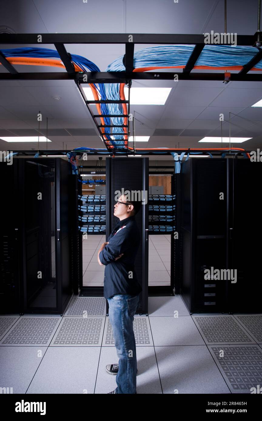 Vertical side shot male asian hi-res stock photography and images - Alamy