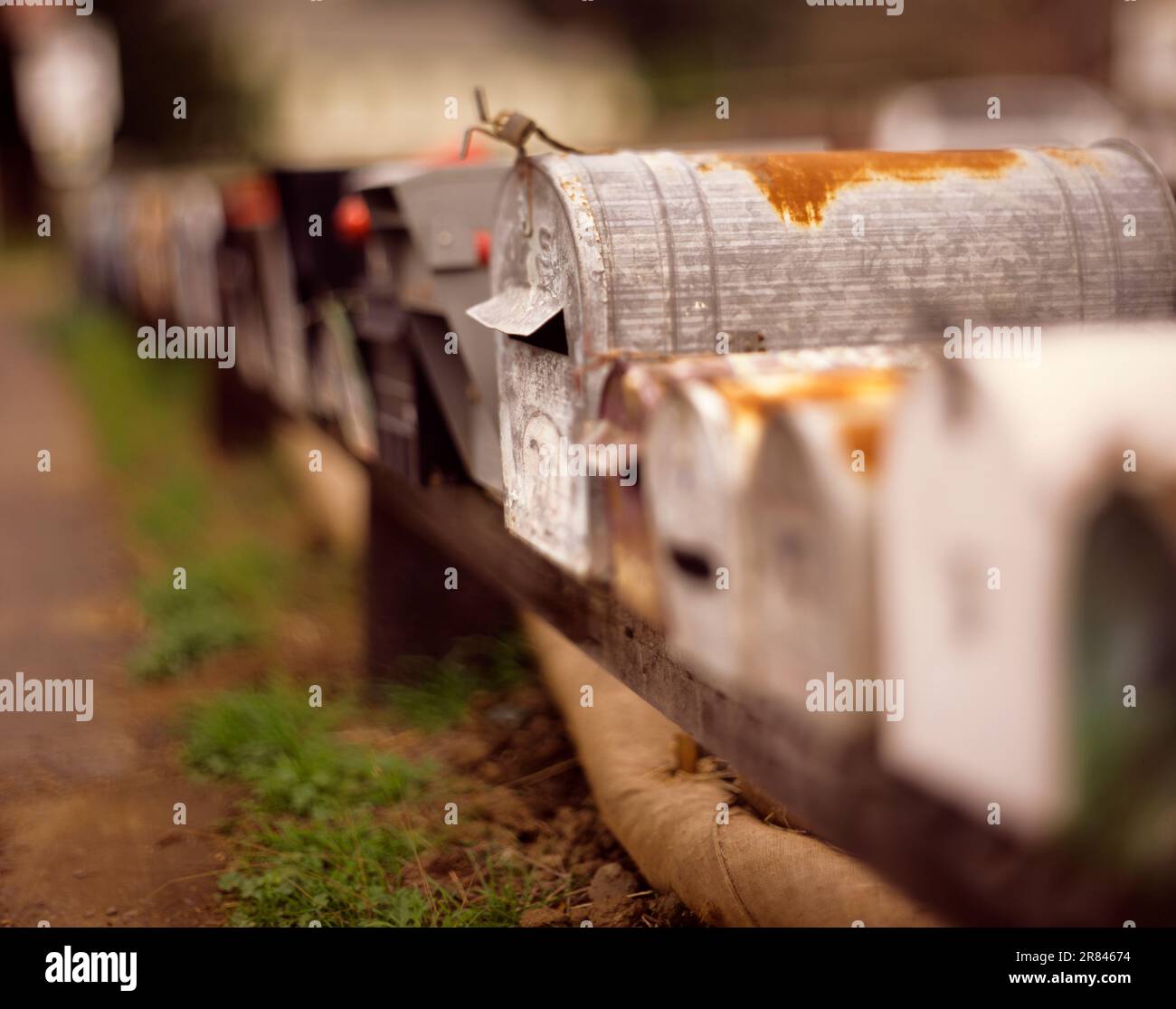 A long row of mailboxes line a rural road in Califorinia Stock Photo ...