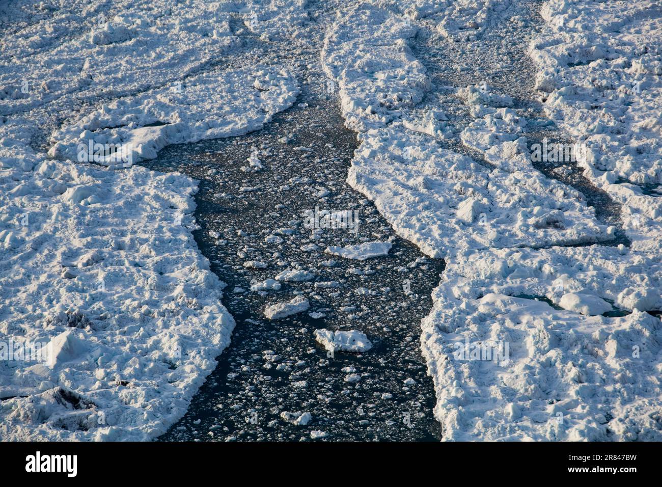 Fractured ice calved by the Columbia Glacier forms thick floating rafts ...