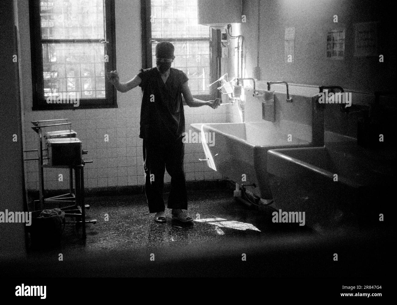 A Surgeon washing before operation at Hanoi Pediatrics Hospital Stock ...