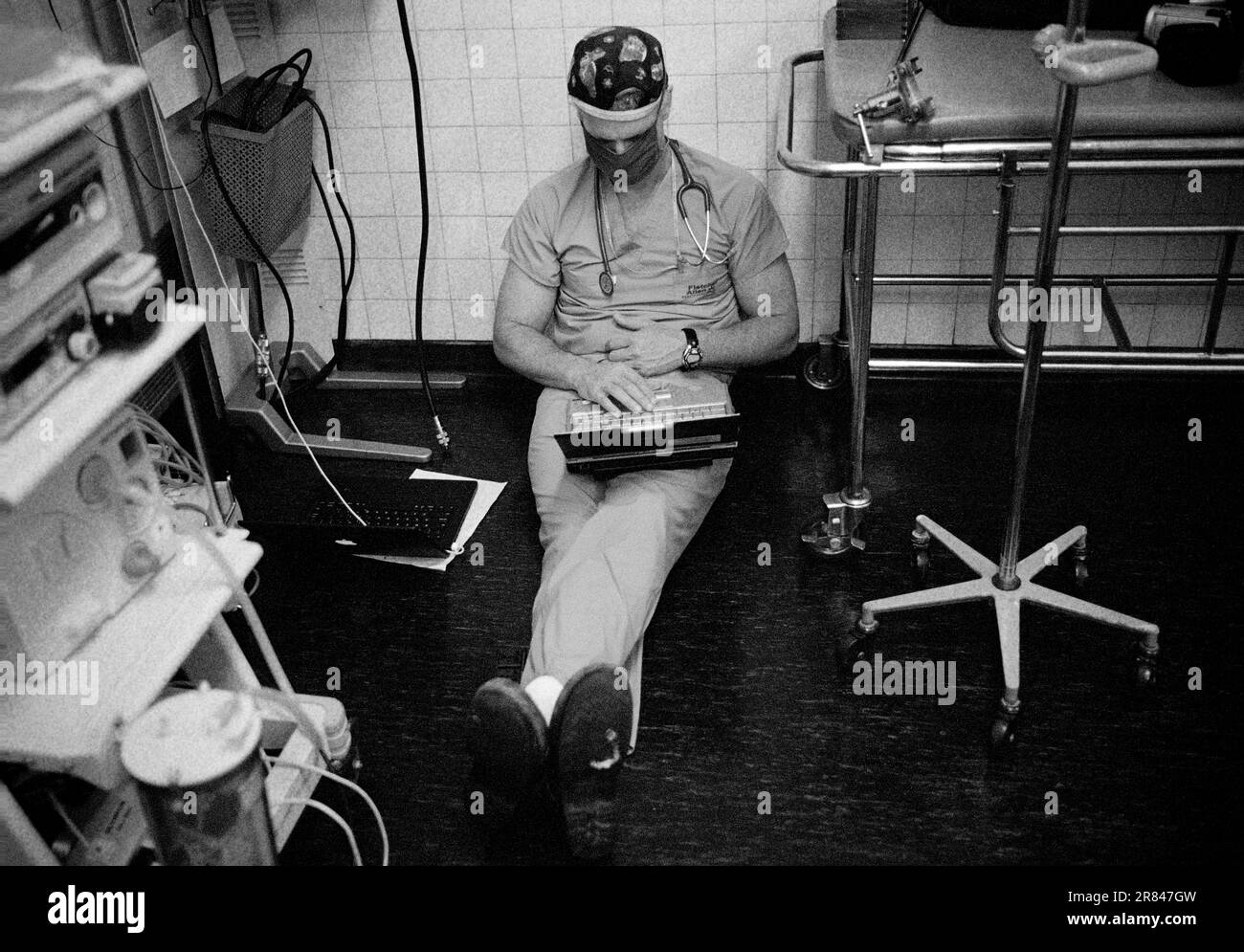A Surgeon studying his computer at Hanoi Pediatrics Hospital, Ha Stock ...