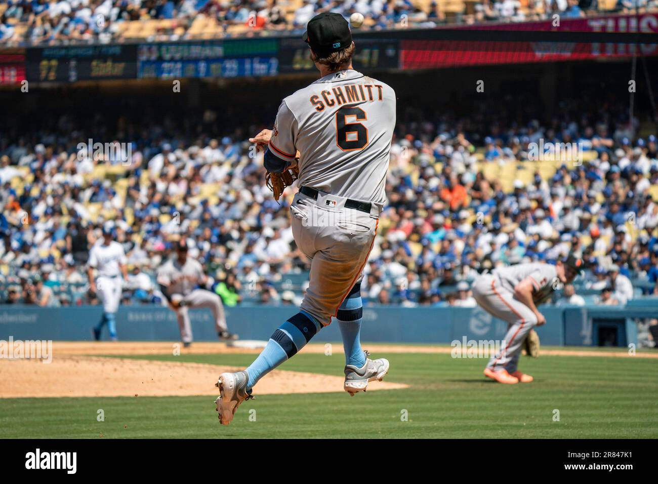 San Francisco Giants shortstop Casey Schmitt (6) throws to first base ...