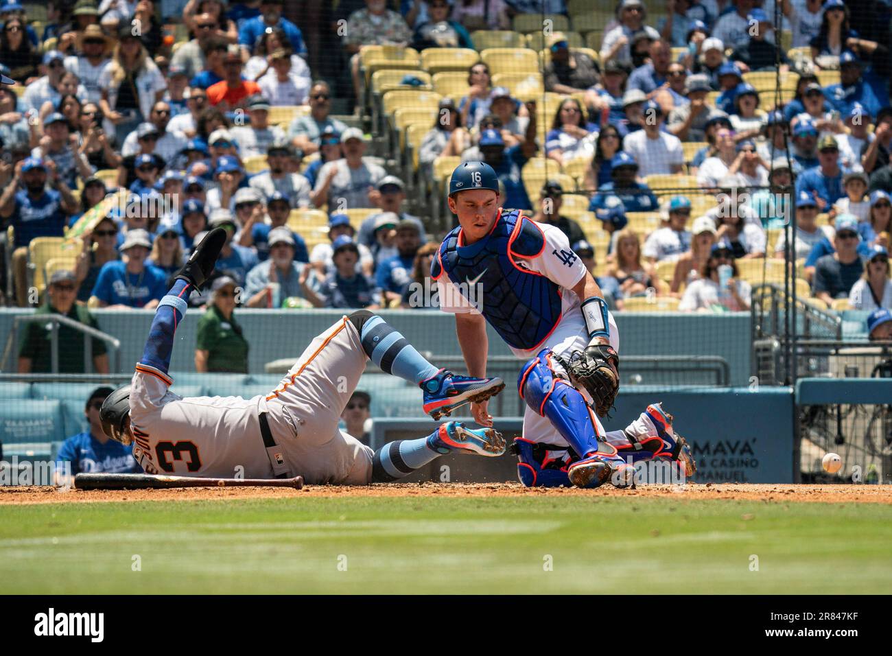 Los Angeles Dodgers catcher Will Smith (16) loses the ball attempting ...