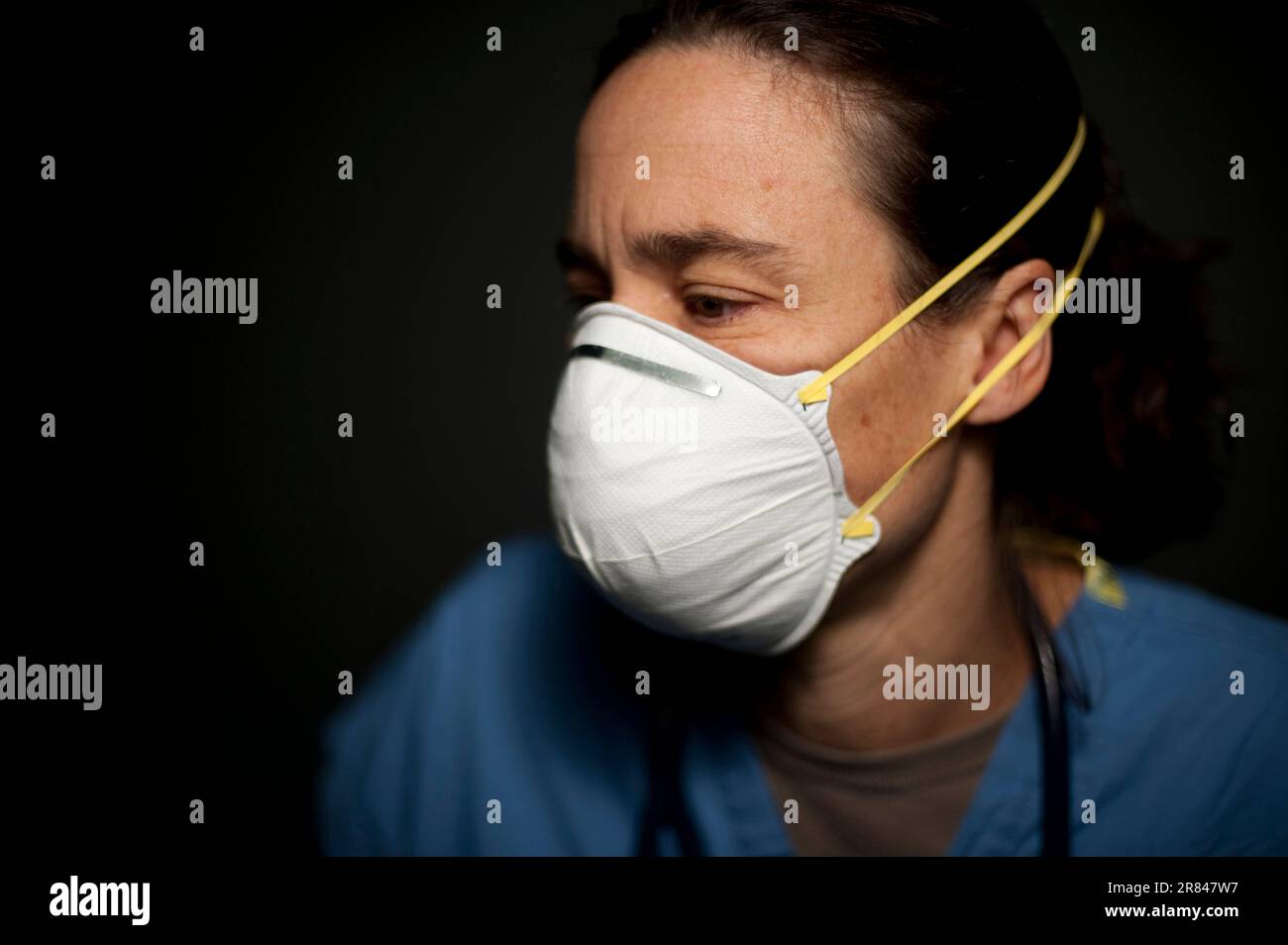 Studio portrait of 42 year old caucasian female registered nurse ...