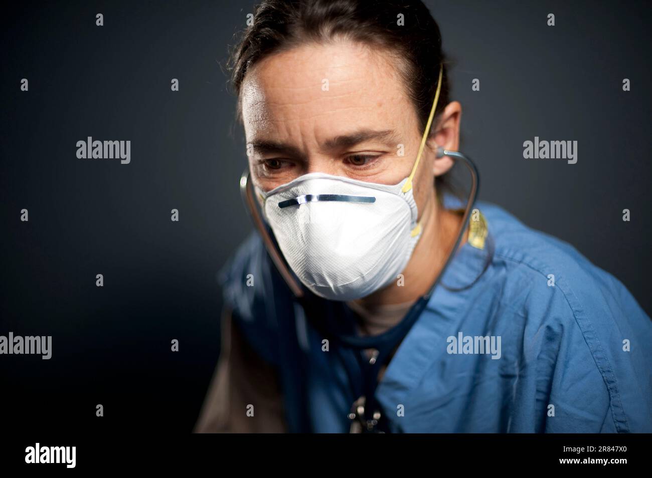 Studio portrait of 42 year old caucasian female registered nurse ...