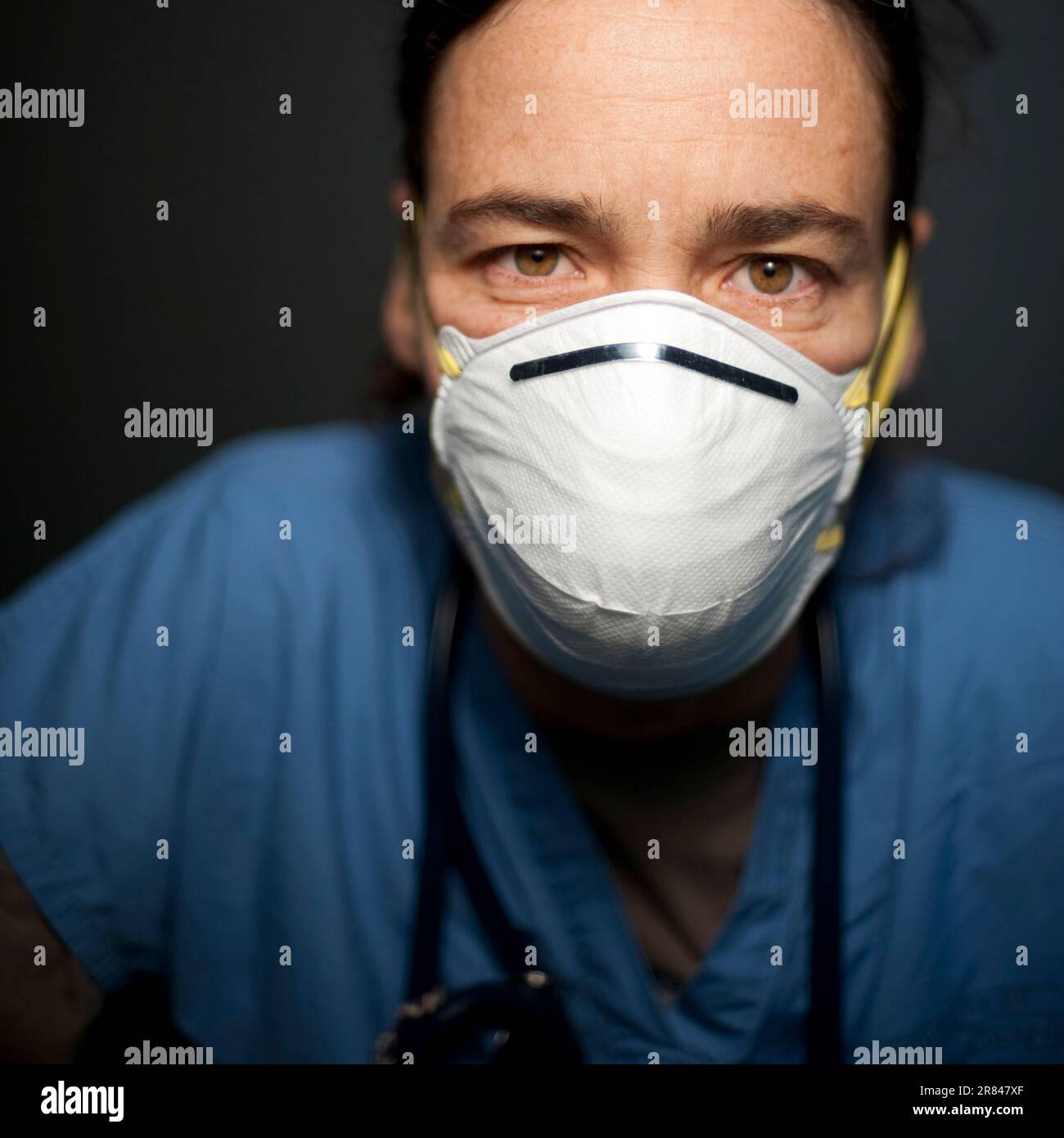 Studio portrait of 42 year old caucasian female registered nurse ...