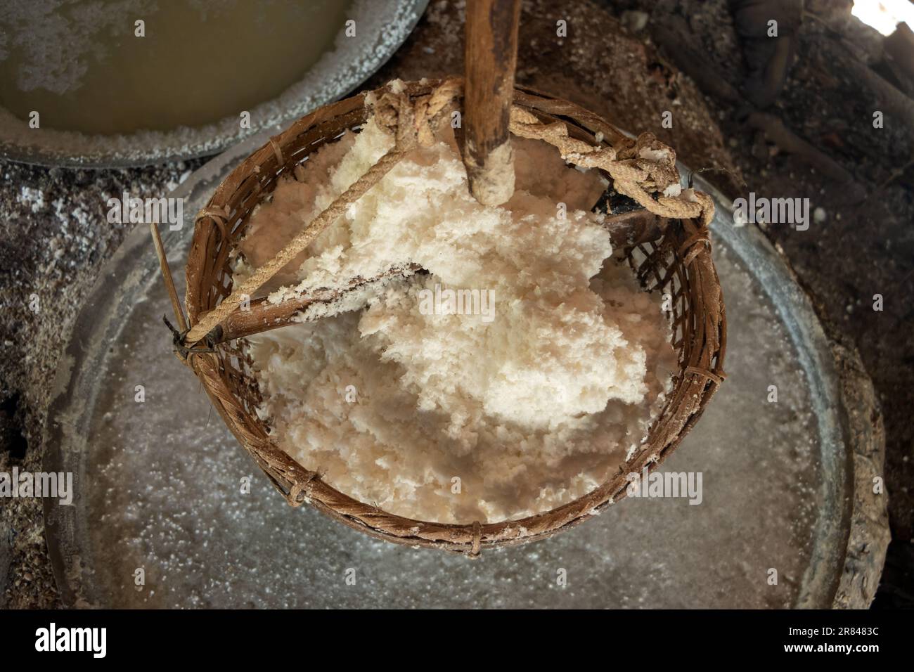 Boiling rock salt, traditional salt making of Bo Kluea rock salt pond ...