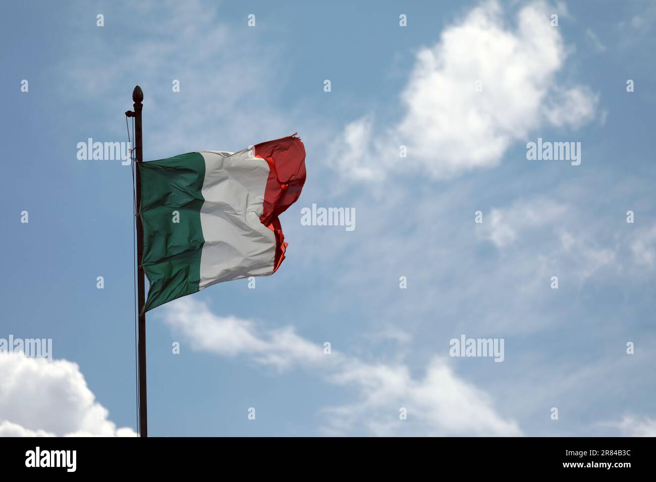 Italian flag waving in the wind outdoor Stock Photo - Alamy