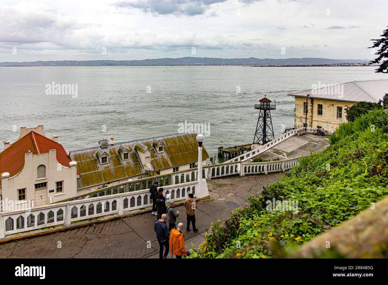 Views of the pier and watchtower of the Alcatraz maximum security ...