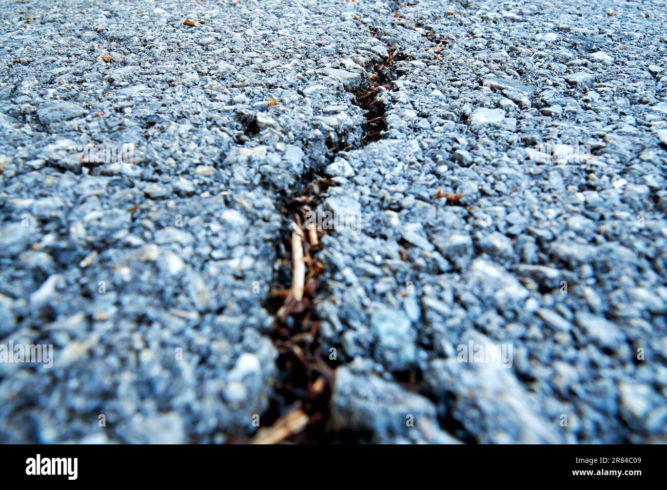 Big crack on the old country asphalt road. Abstract conceptual images ...
