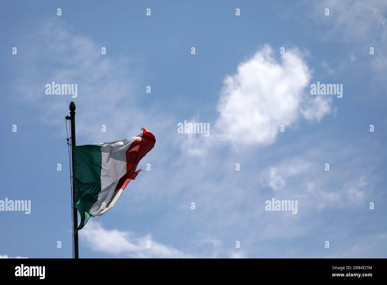 Italian flag waving in the wind outdoor Stock Photo - Alamy