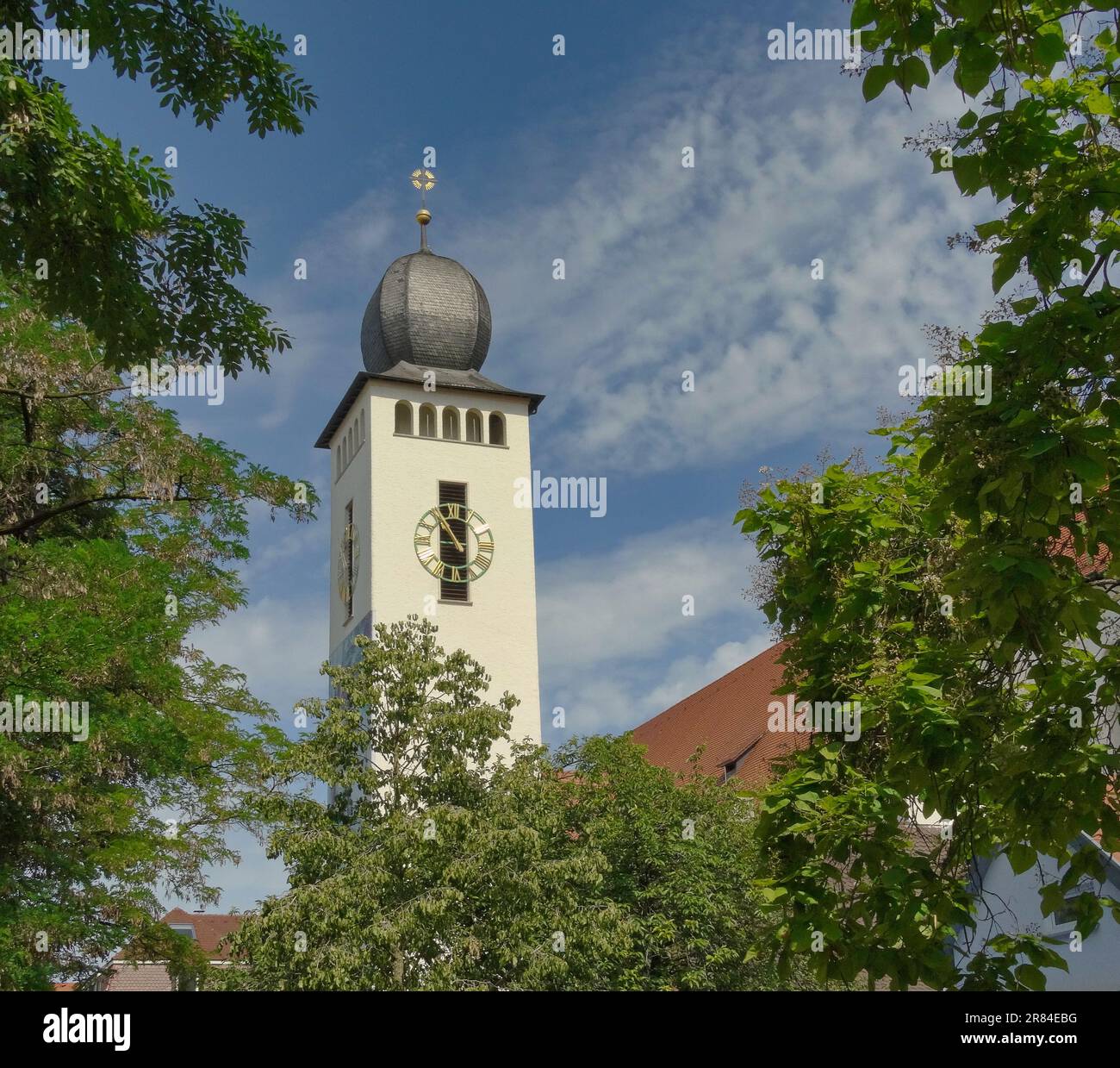 A stunning church tower located in Bretten, Germany against a bright ...