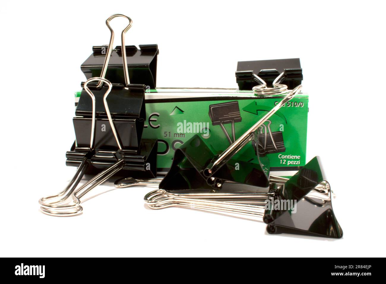 A stack of shiny metal binders against a white background Stock Photo ...