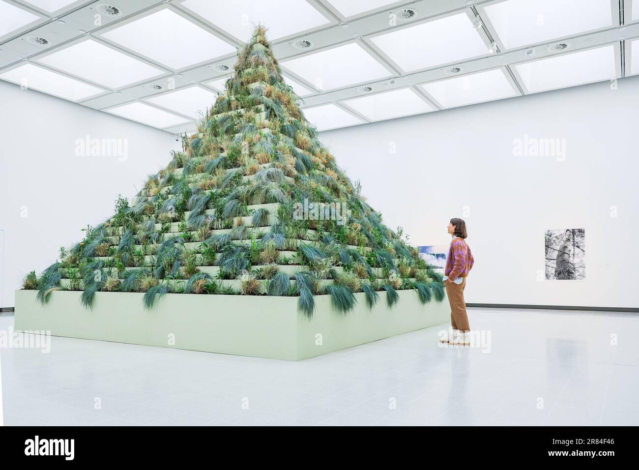 London, UK. 19th June, 2023. A visitor poses with Agnes Denes 'Pascal's ...