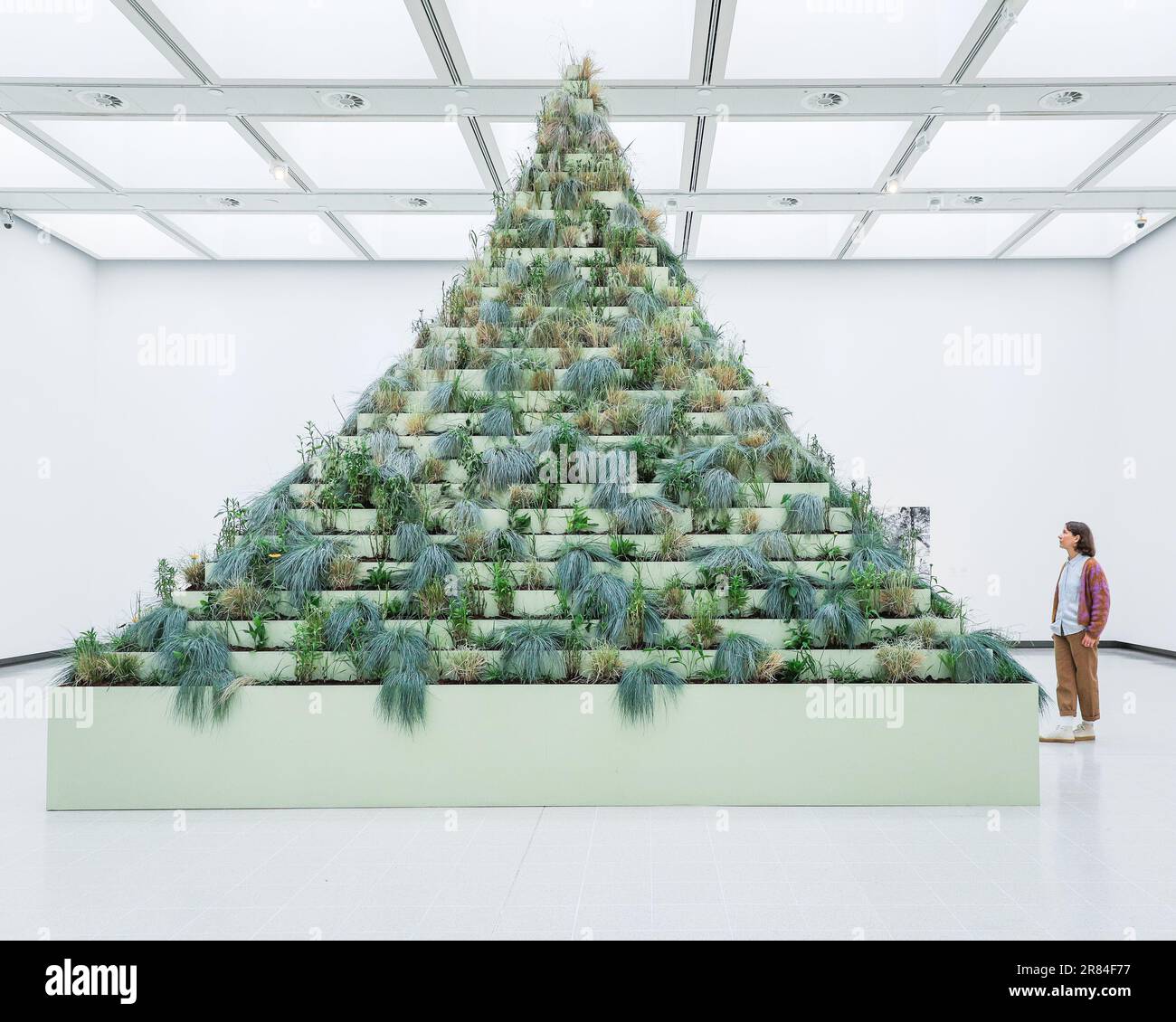 London, UK. 19th June, 2023. A visitor poses with Agnes Denes 'Pascal's ...