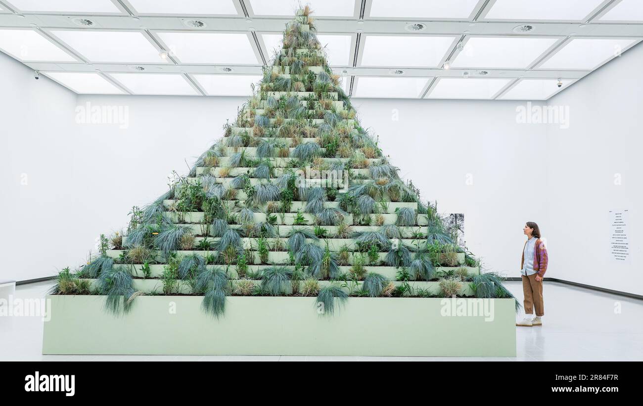 London, UK. 19th June, 2023. A visitor poses with Agnes Denes 'Pascal's ...