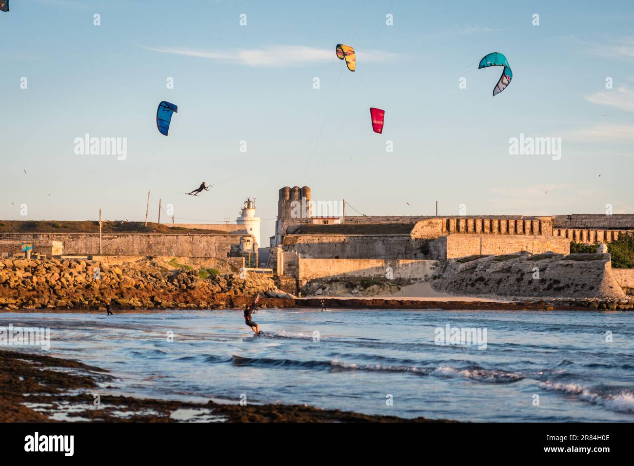 sunset kiteboarding jumping session in Balneario, Tarifa, Spain, big ...