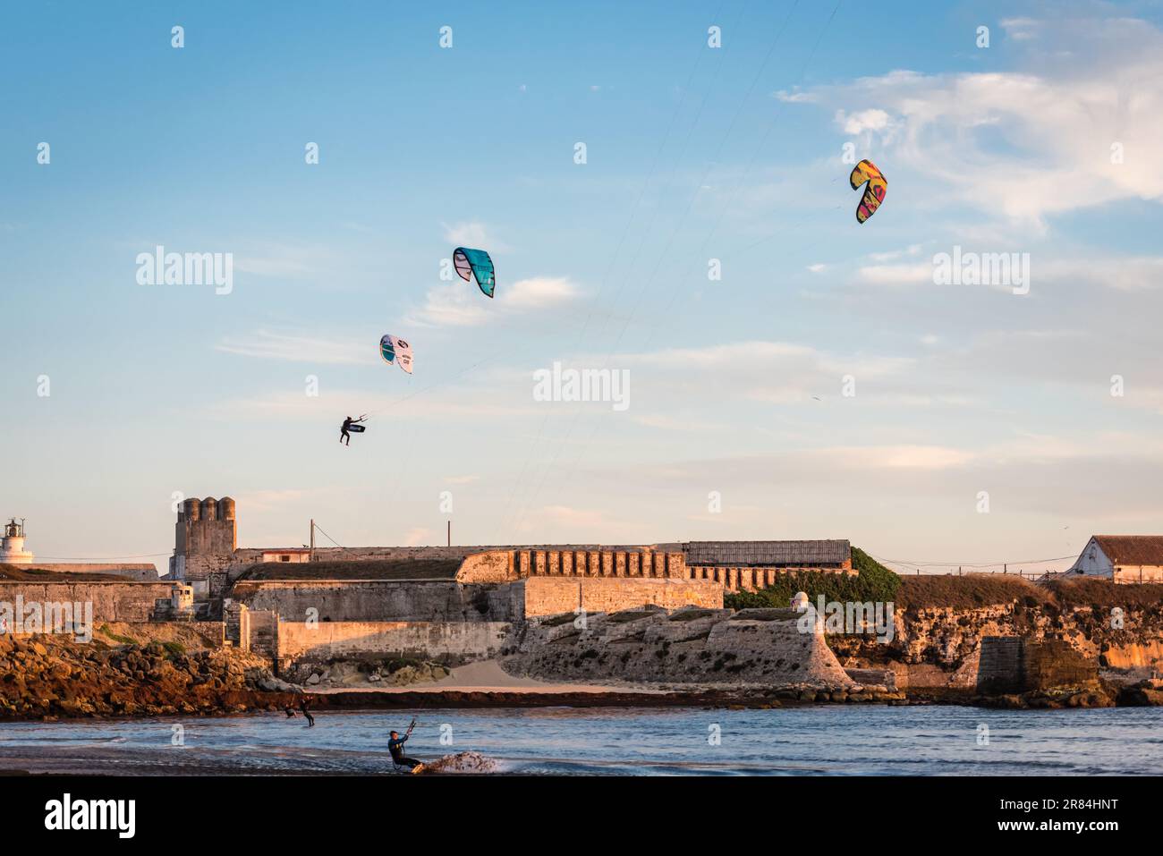 sunset kiteboarding jumping session in Balneario, Tarifa, Spain, big ...