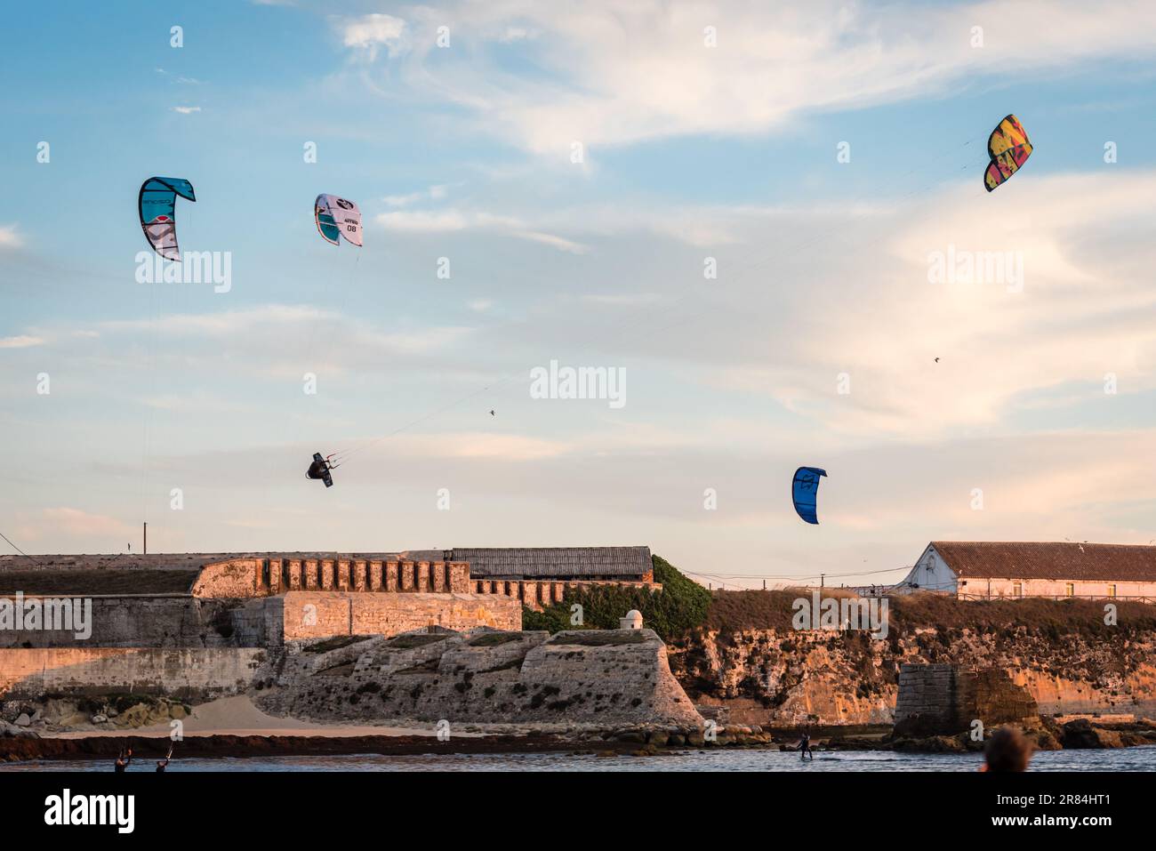 sunset kiteboarding jumping session in Balneario, Tarifa, Spain, big ...