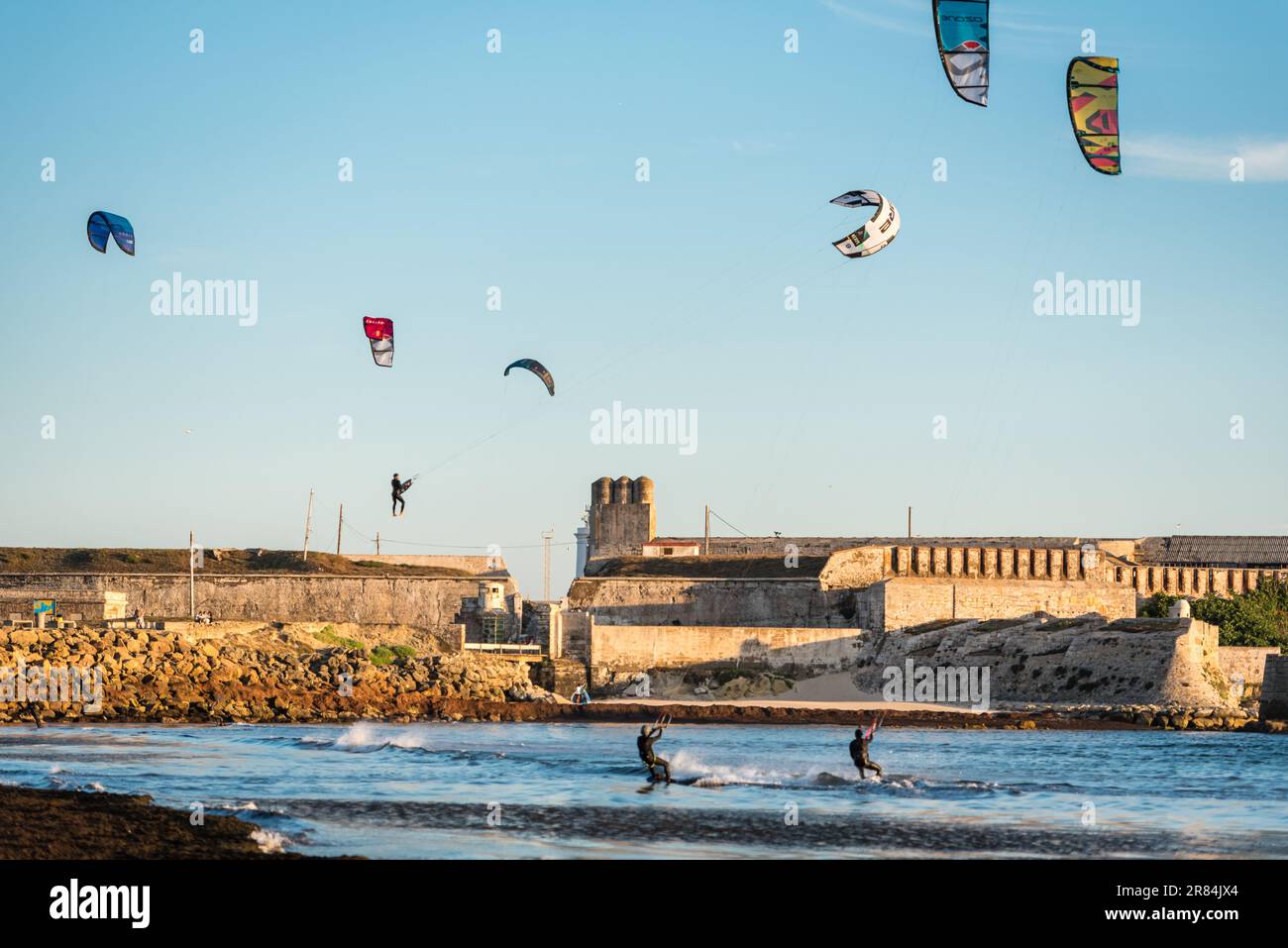 sunset kiteboarding jumping session in Balneario, Tarifa, Spain, big ...