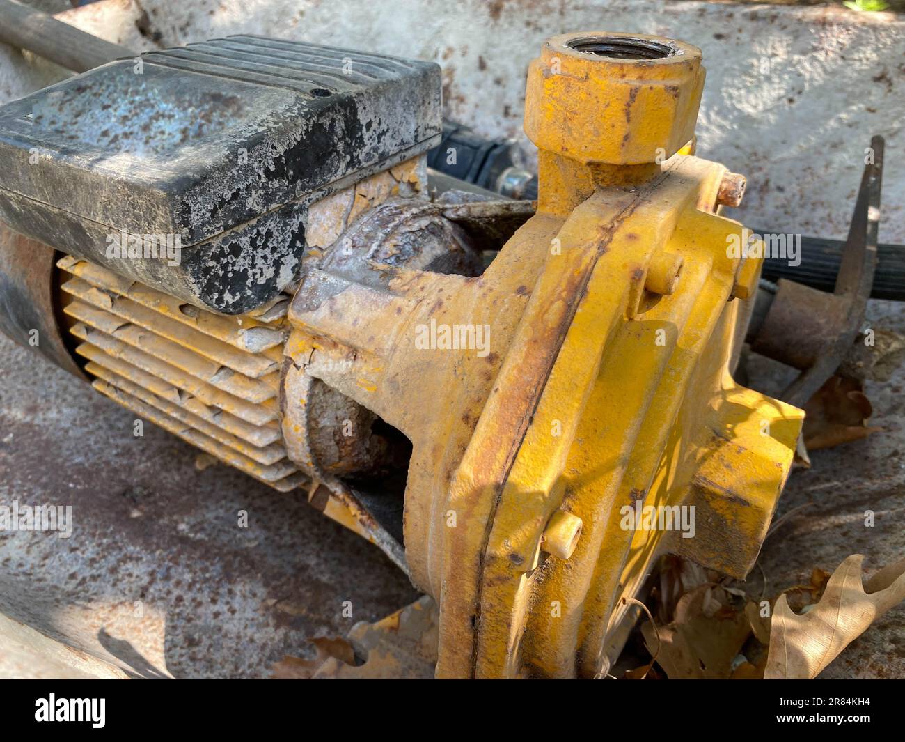 An old and rusty abandoned electric pump on an abandoned Stock Photo ...