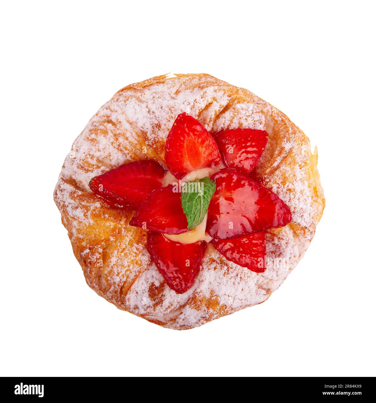 Delectable strawberry puff pastry garnished with mint leaves, set ...