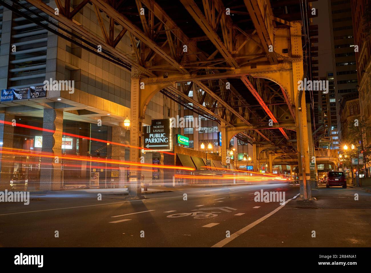 A night skyline featuring illuminated buildings with long exposure ...