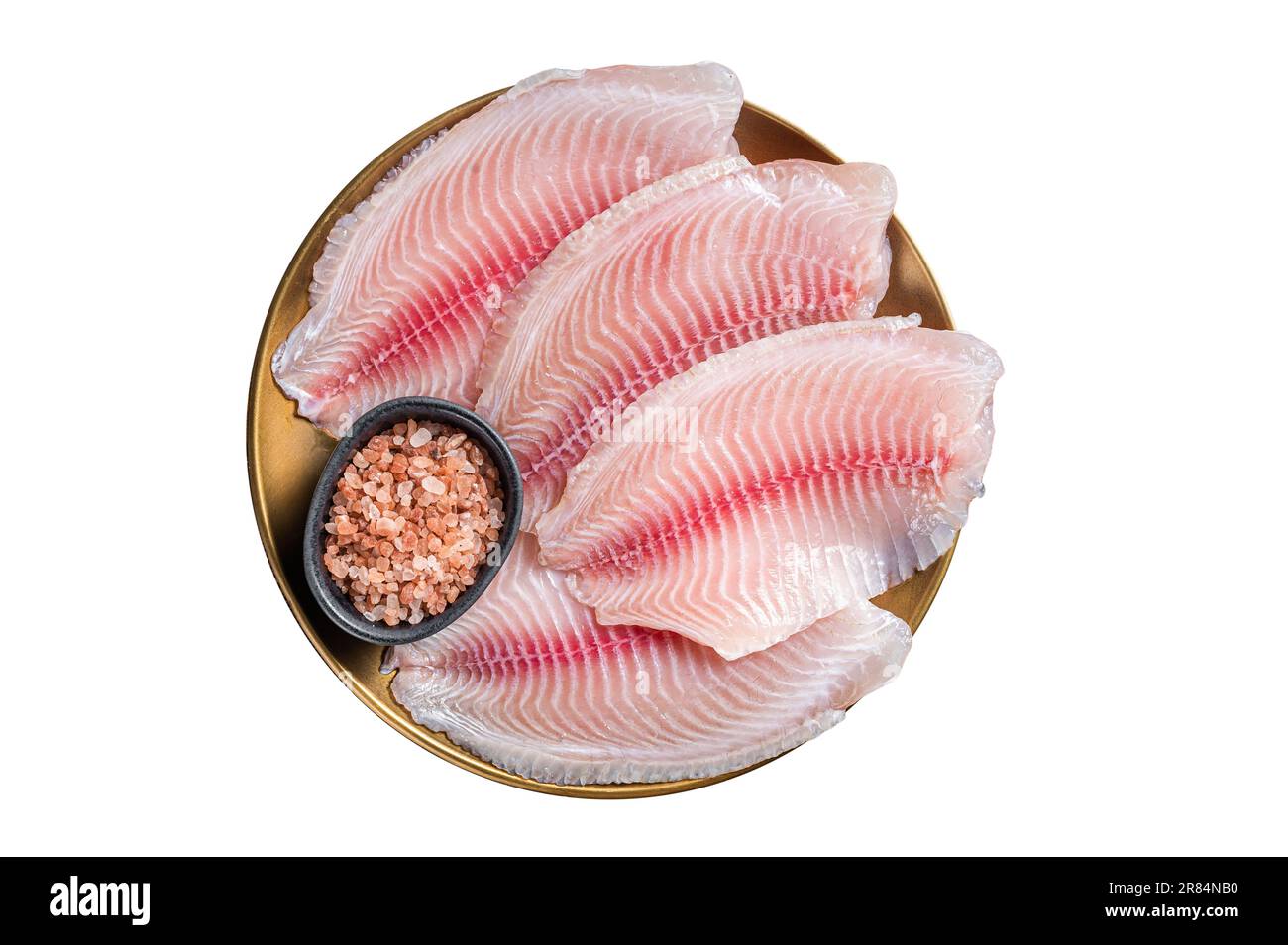 Raw fish fillet of tilapia in a plate with spices. Isolated on white ...