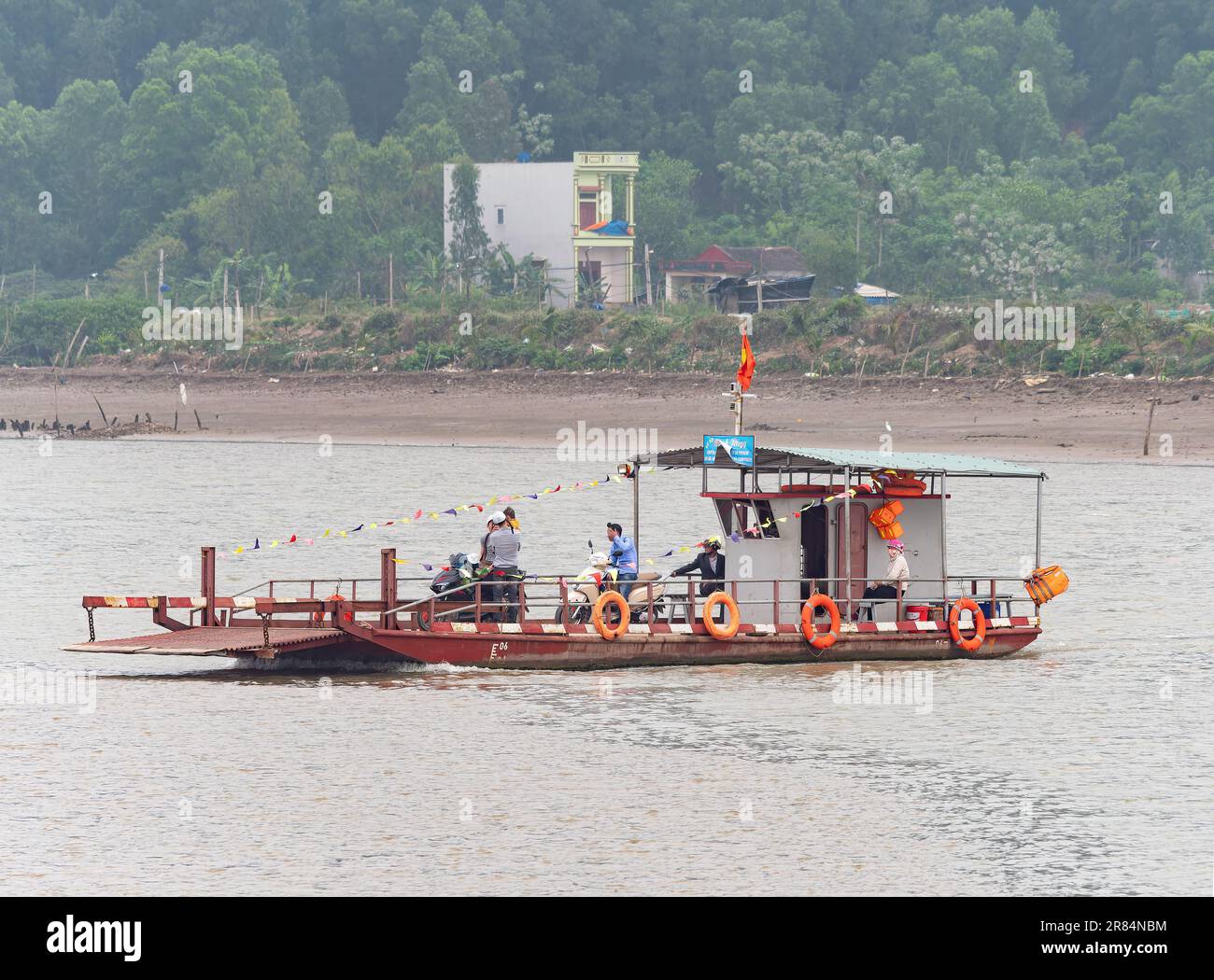 Simple car ferry crossing a river in Thanh Hoa Province in Vietnam with ...