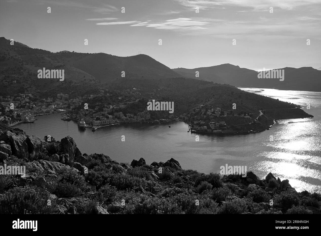 A scenic landscape featuring a mountain side with a clear blue sky ...