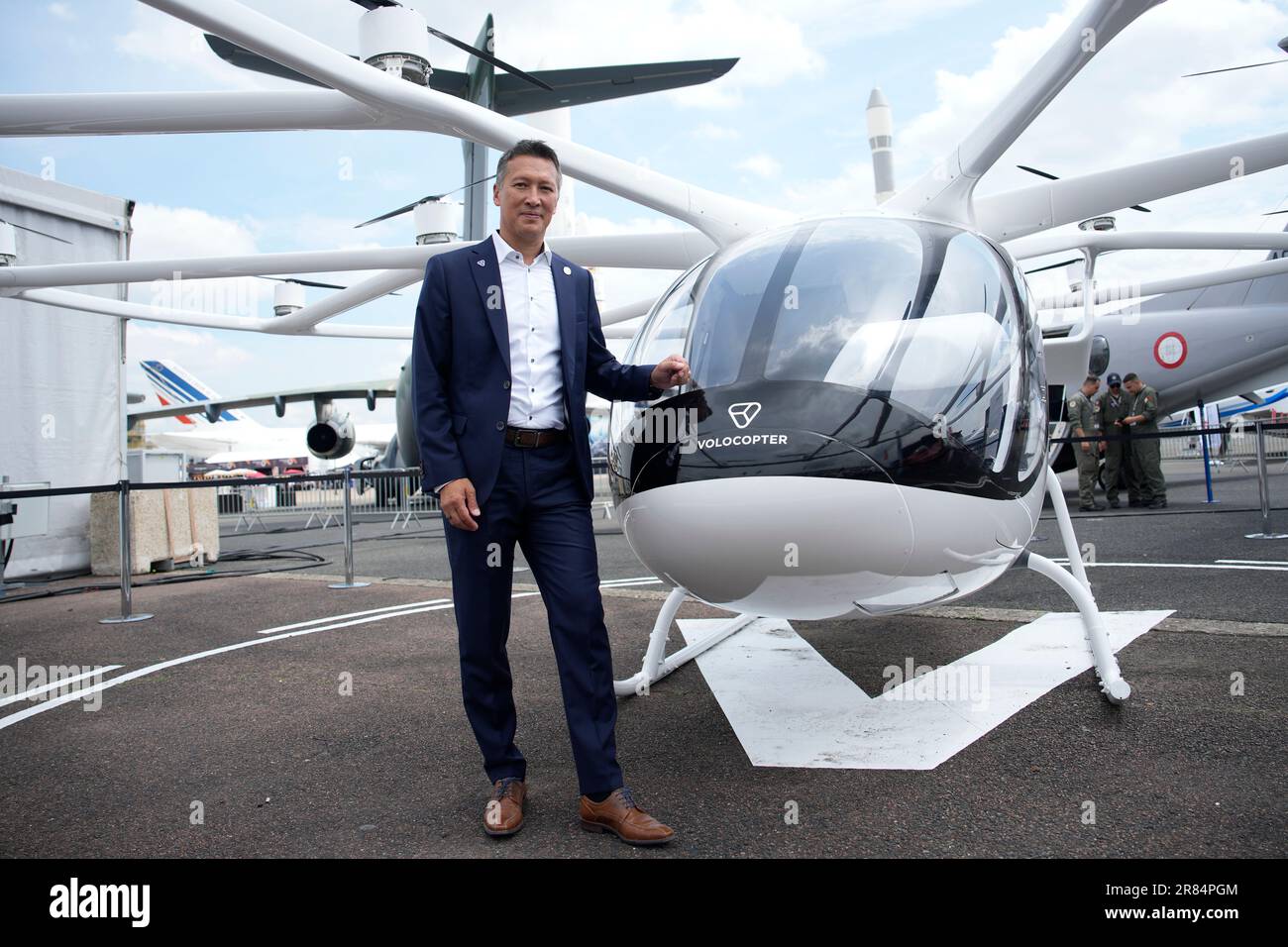 Volocopter CEO Dirk Hoke poses for a picture next to the Volocopter 2X ...