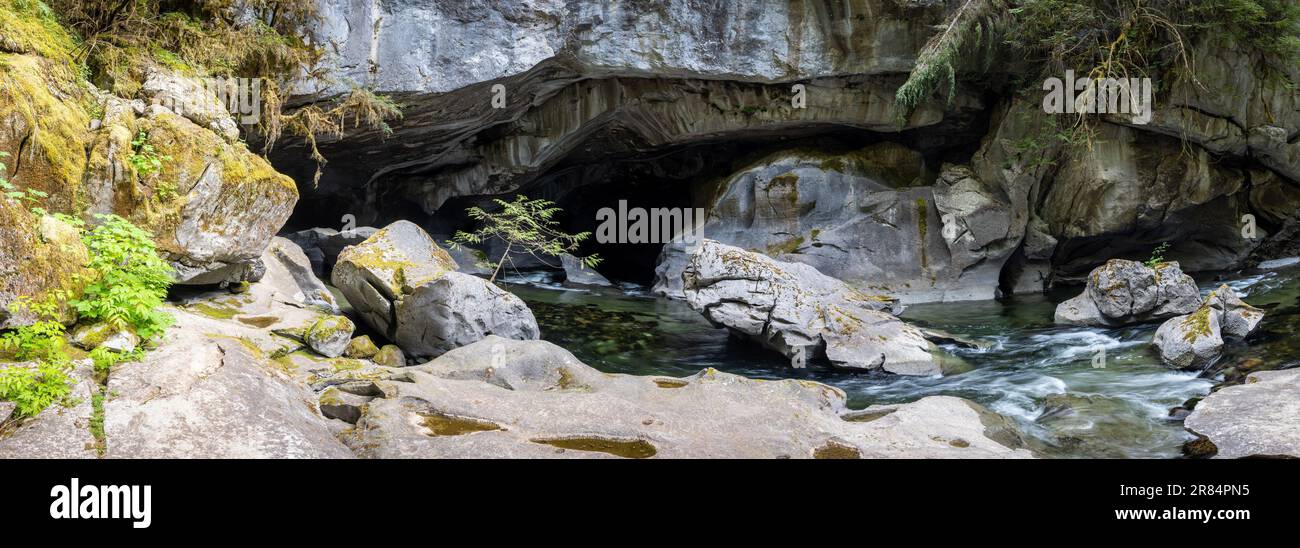 A panorama of the opening of a cave Stock Photo - Alamy
