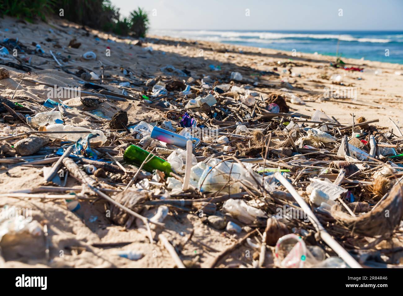 Tropical ocean beach and plastic trash in Bali island. Pollution by ...