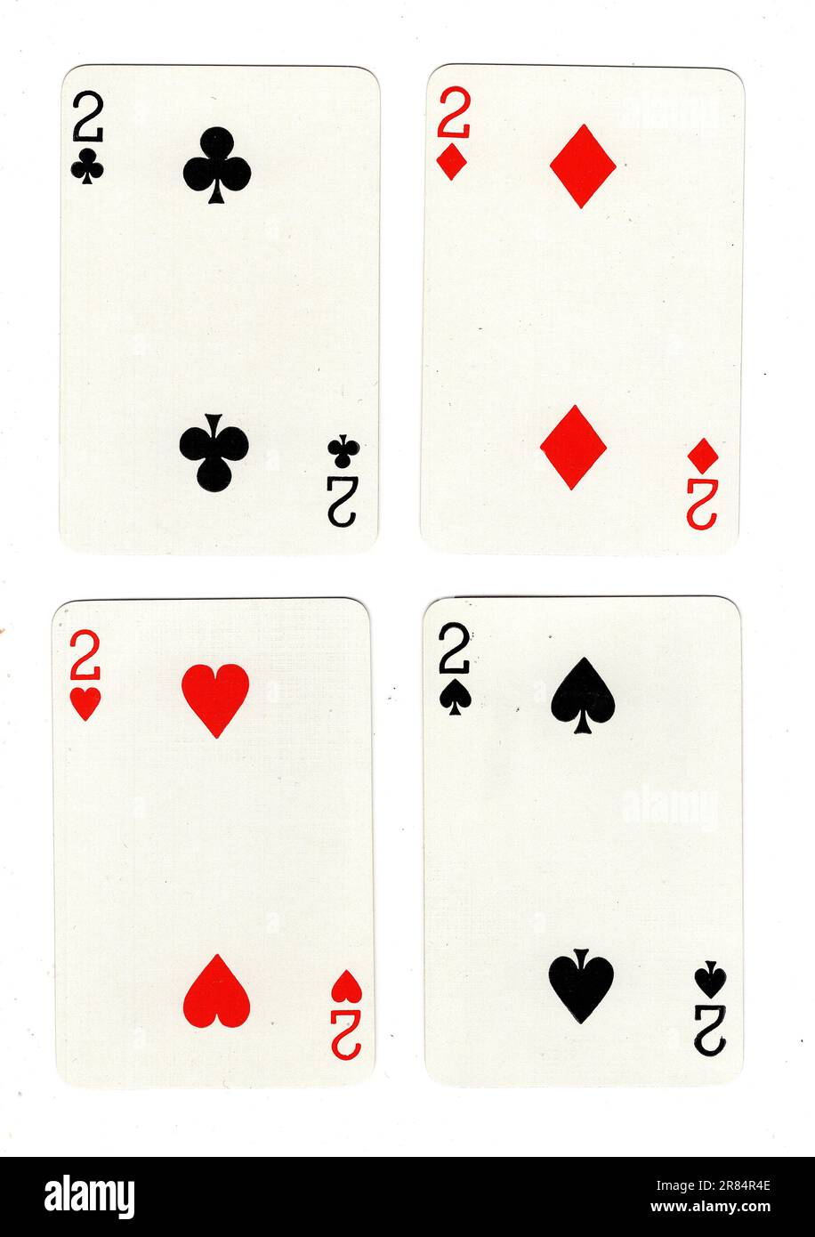 Vintage playing cards featuring four twos on a white background Stock ...