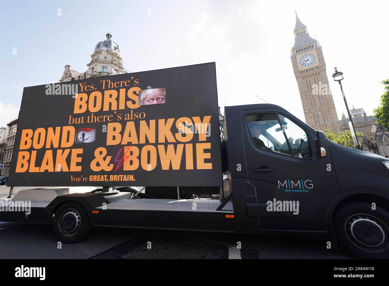 EDITORIAL USE ONLY A mobile billboard outside the Houses of Parliament ...