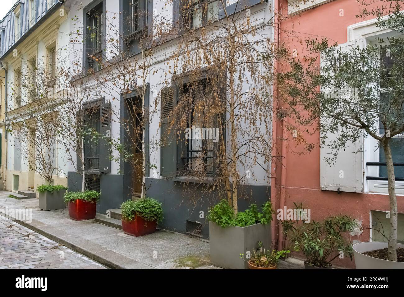 A scenic view of colorful houses rue Cremieux in Paris, France Stock ...